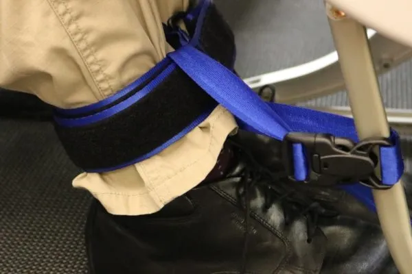 New restraint system addresses airline passenger violence - Runway ...