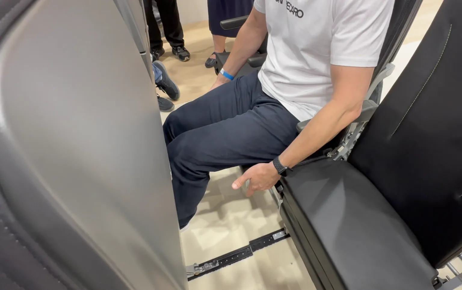 Flip-up exit mini-seat enables density, but at what cost?Runway Girl