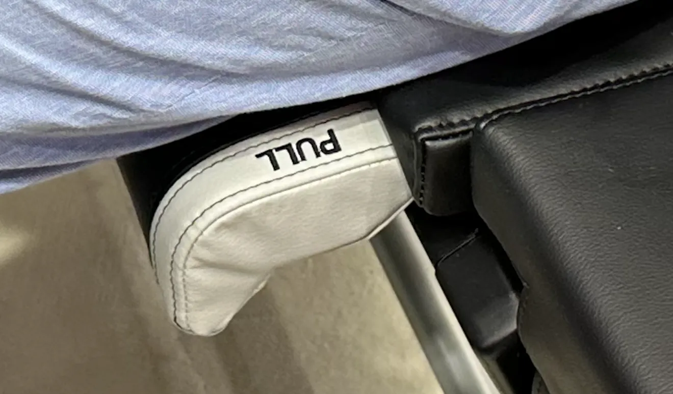 Flip-up exit mini-seat enables density, but at what cost?Runway Girl